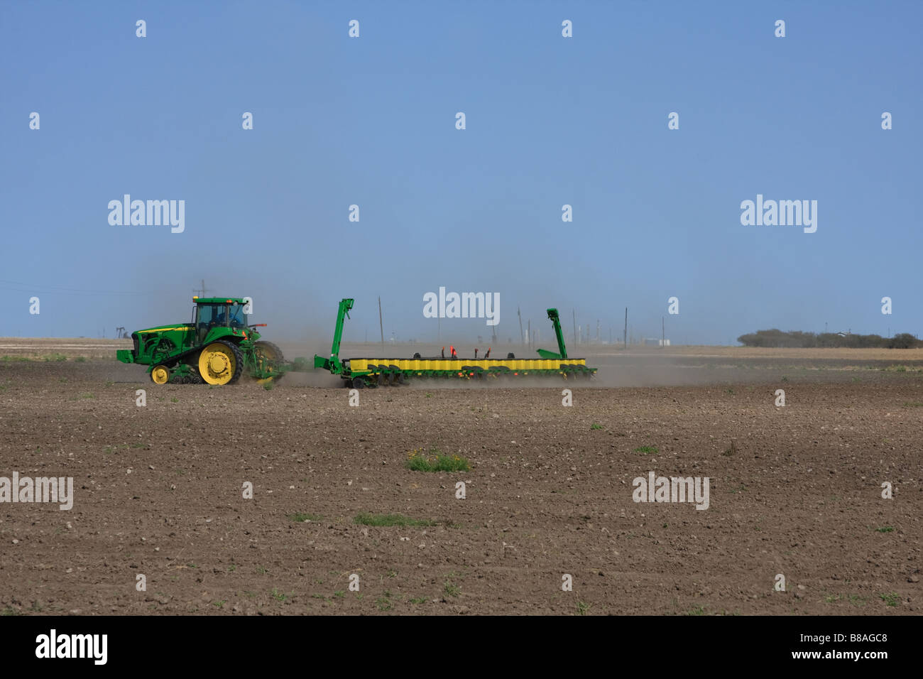 John Deere tractor seeding a field Stock Photo - Alamy