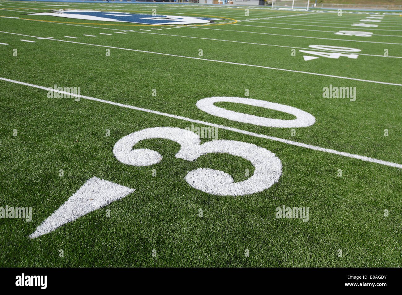 A new astro turf foot ball field Stock Photo - Alamy
