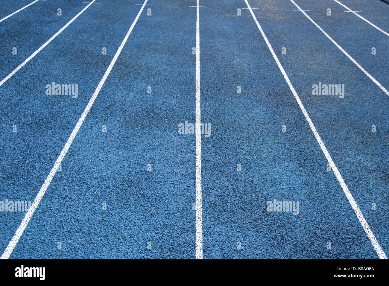 A blue track at a High School Stock Photo - Alamy