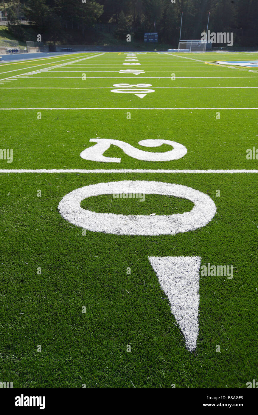 A new astro turf foot ball field Stock Photo - Alamy