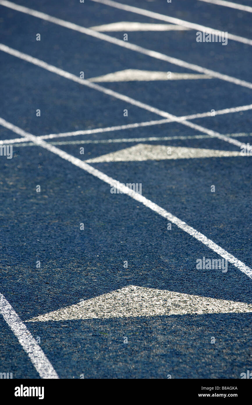 A blue running track at a hight school Stock Photo - Alamy