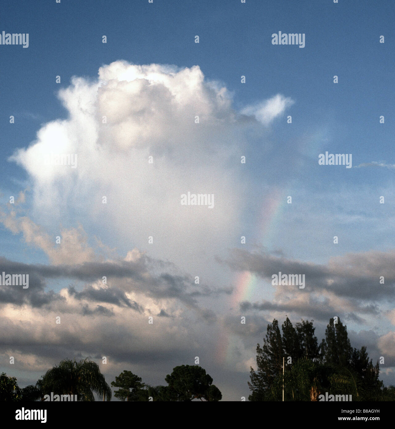 Rainbow and storm clouds at coast hi-res stock photography and images ...