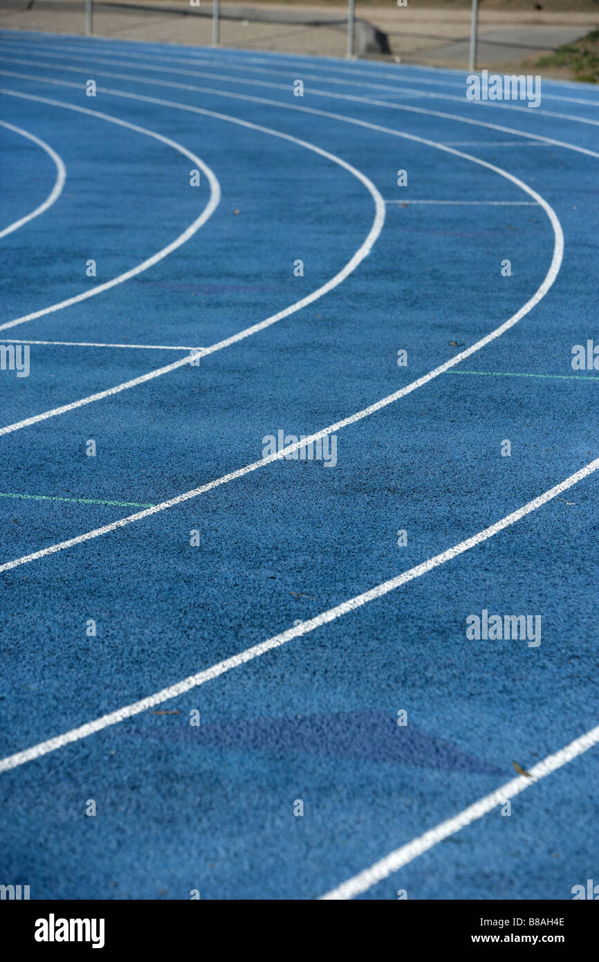 A blue running track at a high school Stock Photo - Alamy