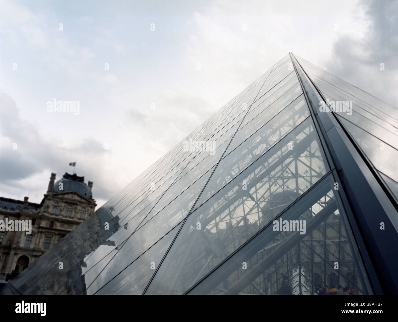 An exterior view of the glass pyramid over the entrance to the Louvre ...