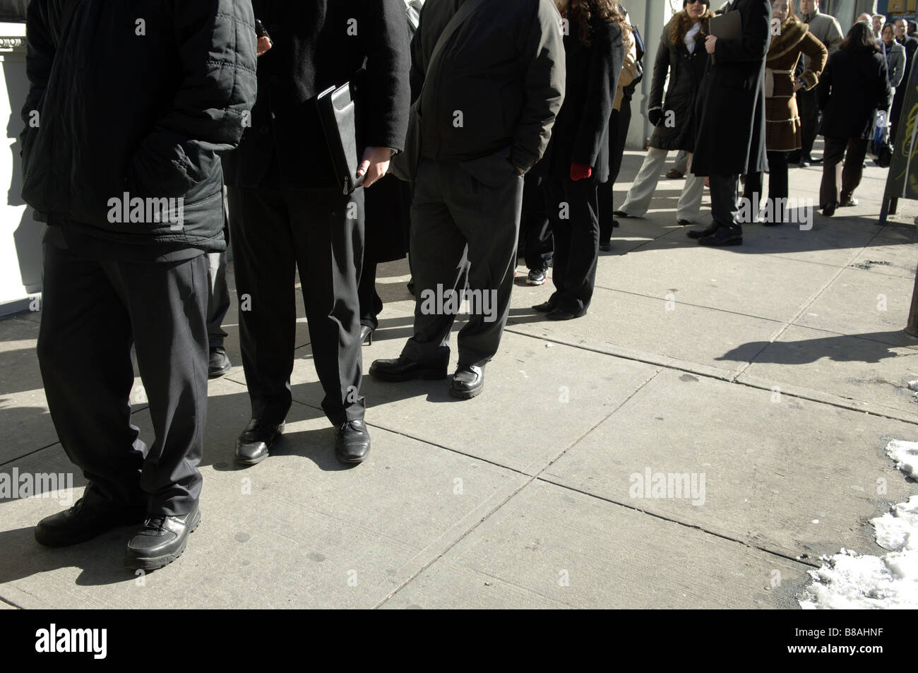 Hundreds of people line up in New York for a job fair sponsored by the ...