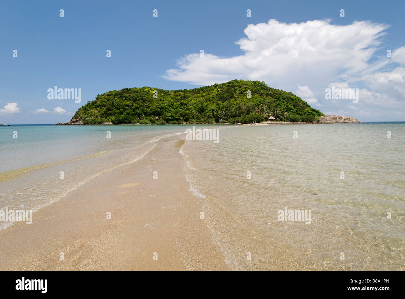 Tidal sandbar connecting small Ko Ma island to the mainland island of ...