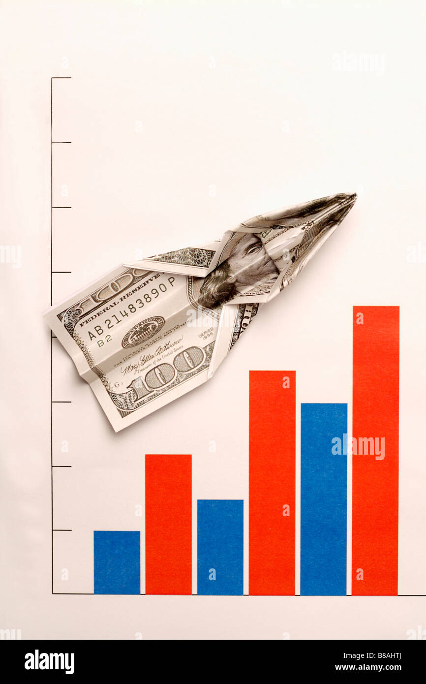 Bar graph and paper plane Stock Photo - Alamy