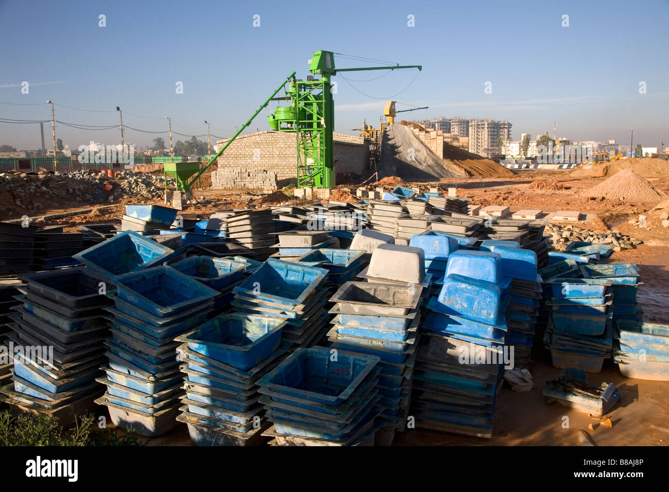 Plastic boxes stand empty on a building site in Bangalore, India Stock ...