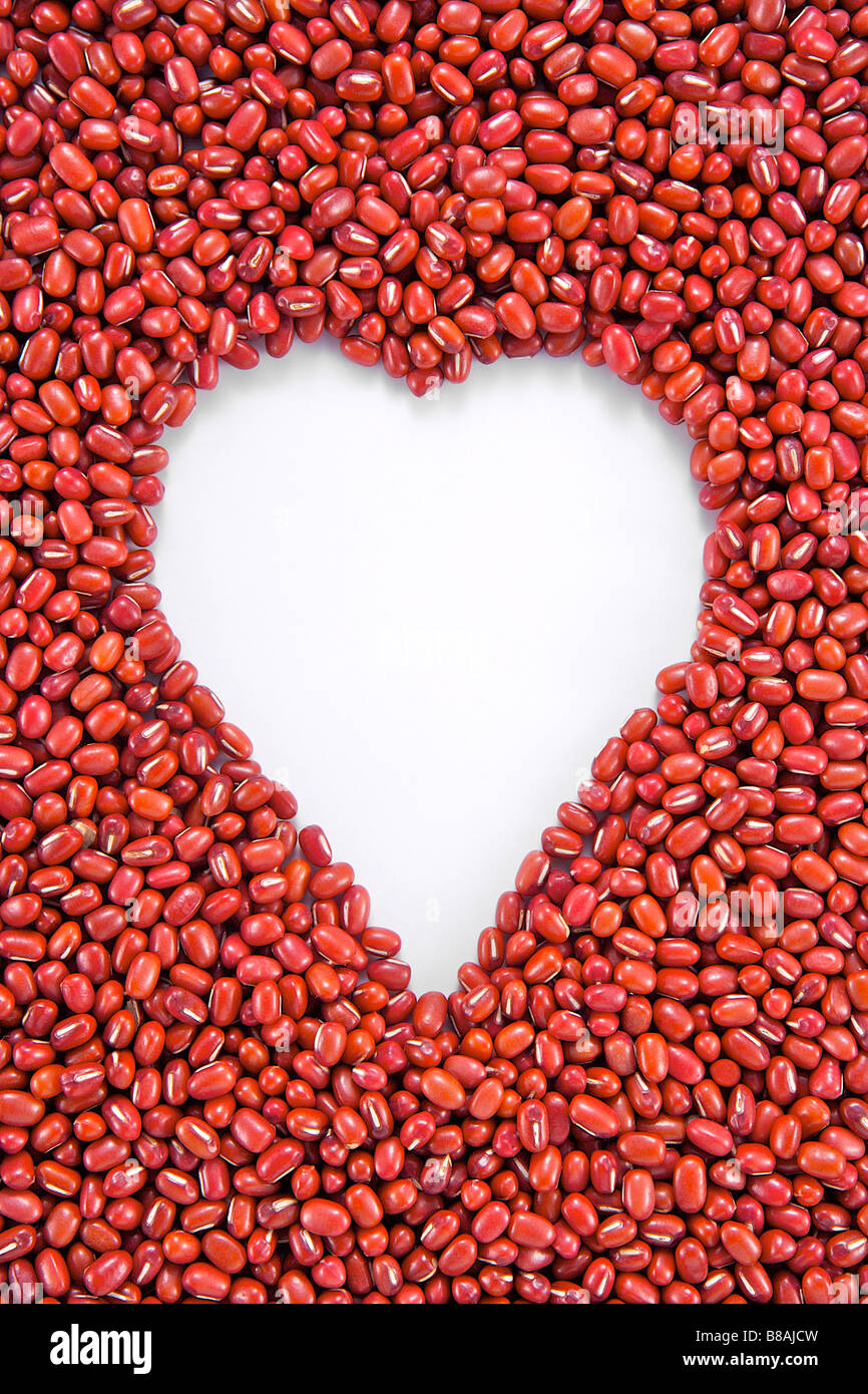 Red beans form heart shape Stock Photo - Alamy