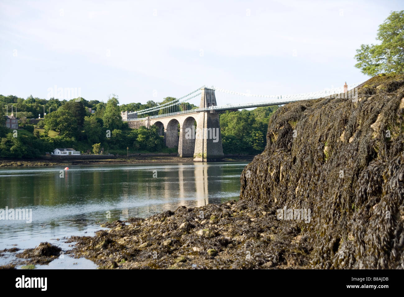 The Suspension Bridge and Menai Straits from Menai Bridge town on ...