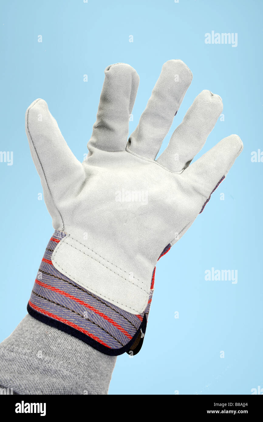 Hand in leather work glove Stock Photo - Alamy