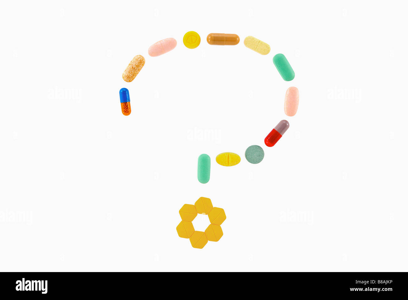Pills form question mark Stock Photo - Alamy