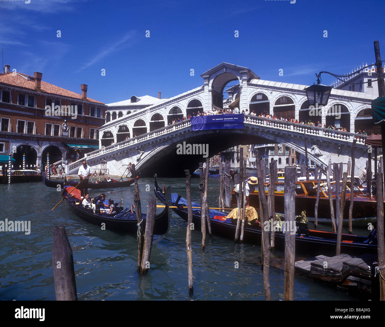 Gondolas by Rialto Bridge, the oldest of the four bridges spanning the ...