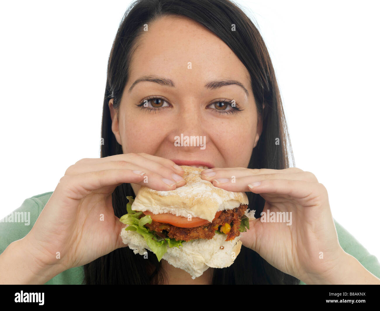 Young Woman Eating Bean Burger Model Released Stock Photo - Alamy