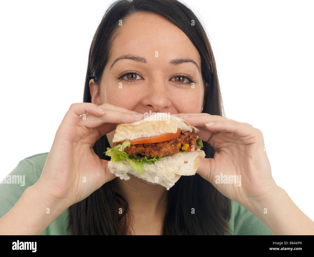 Young Woman Eating Bean Burger Model Released Stock Photo - Alamy