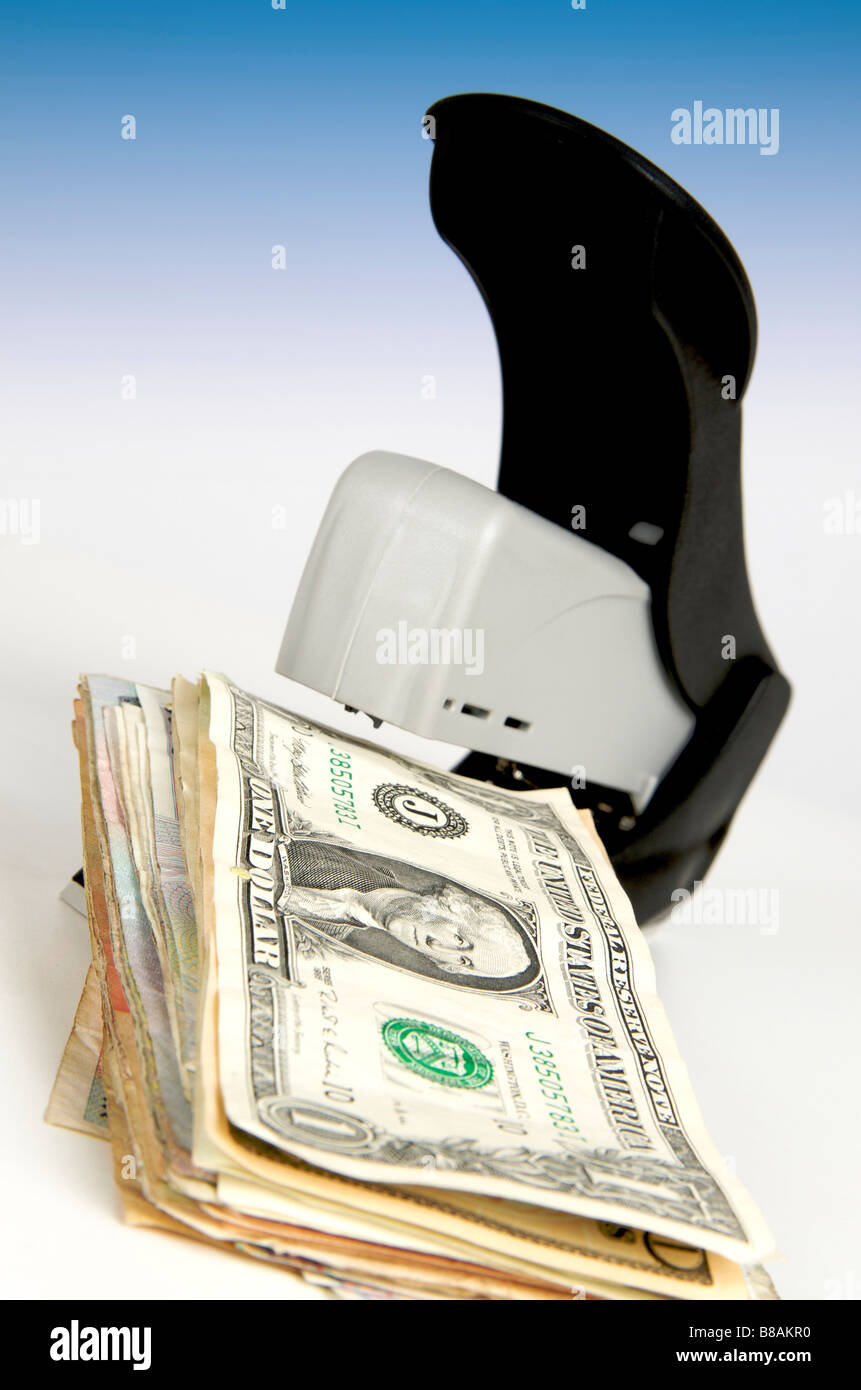 stapler and banknotes Stock Photo - Alamy