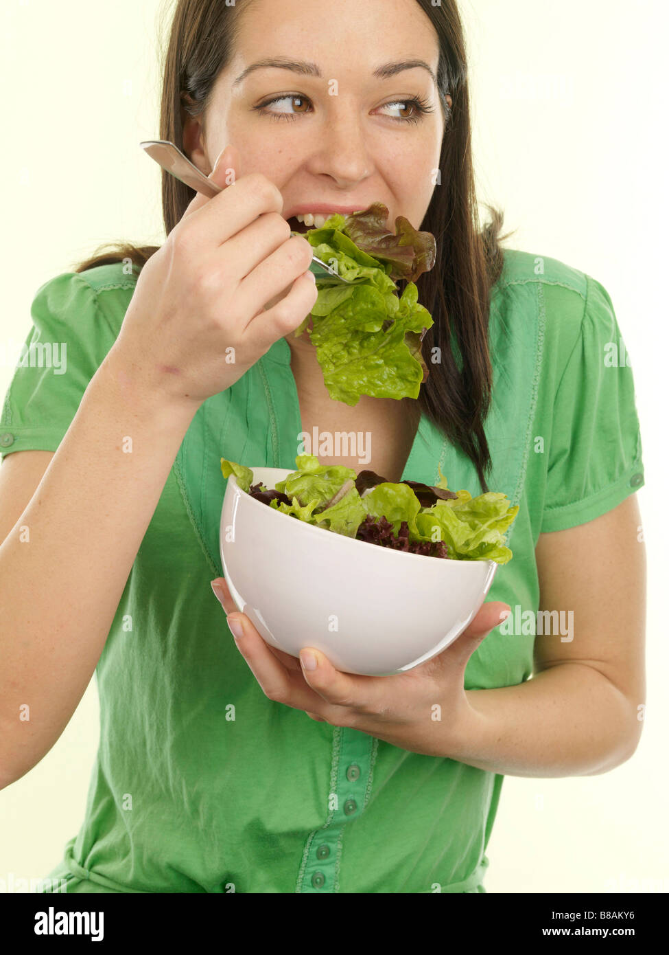 Young Woman Eating Green Salad Model Released Stock Photo - Alamy