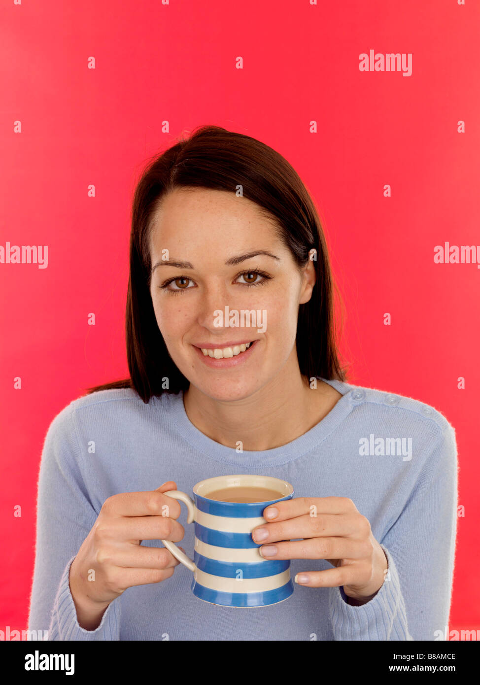 Young Woman With Hot Drink Model Released Stock Photo - Alamy
