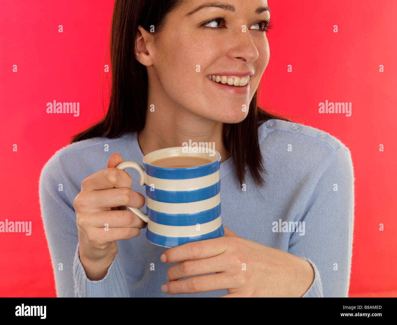 Young Woman With Hot Drink Model Released Stock Photo - Alamy