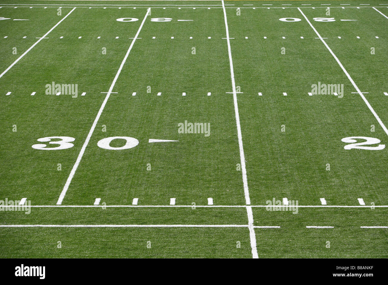 A new astro turf foot ball field Stock Photo - Alamy