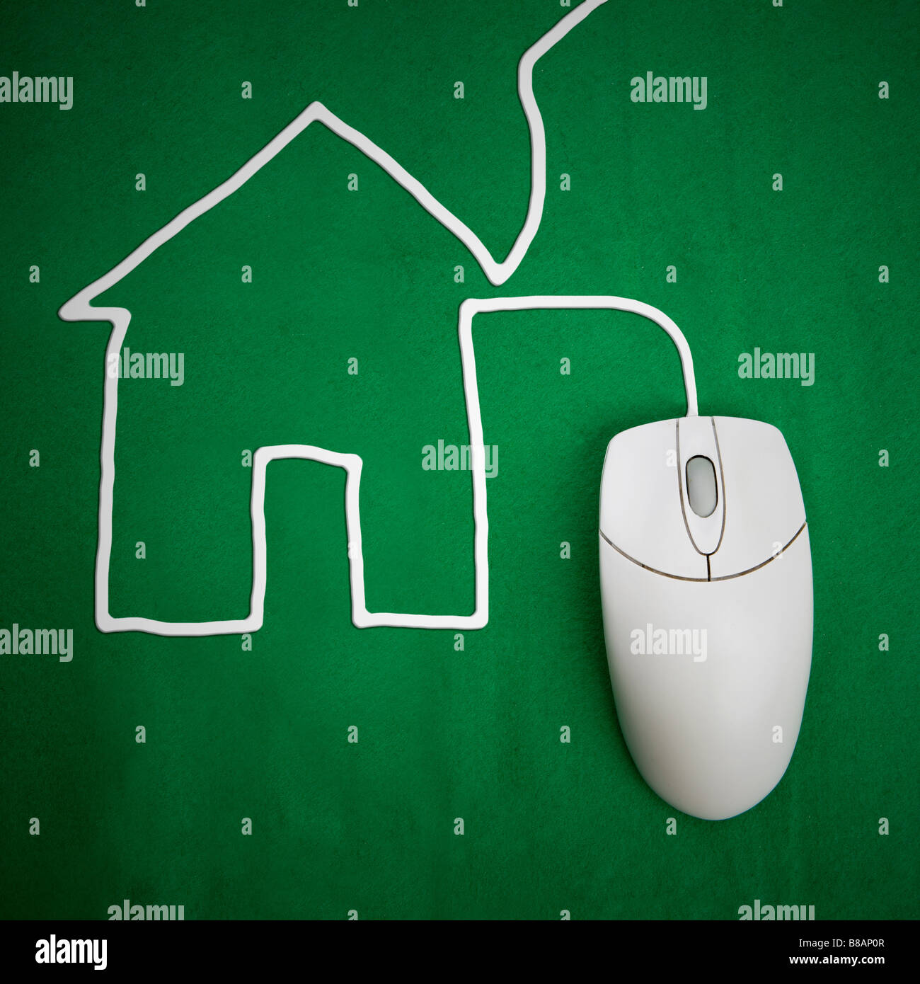A housing concept with computer mouse and cord in the shape of a house ...