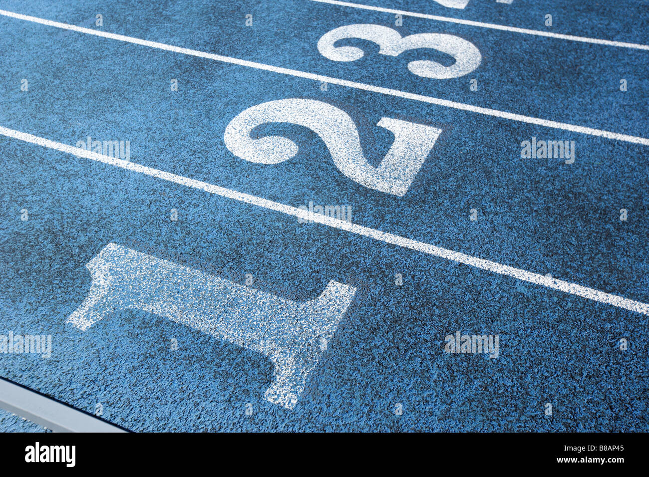 A blue track at a High School Stock Photo - Alamy