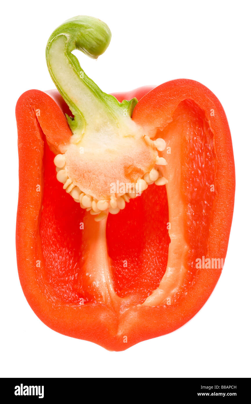 Cutout of a red pepper cut in half lengthways exposing the seeds Stock ...