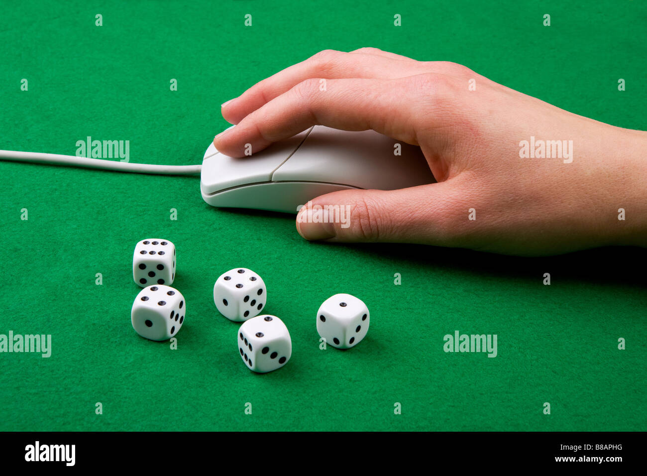 Dice and a computer mouse on a green background Online Gaming concept ...
