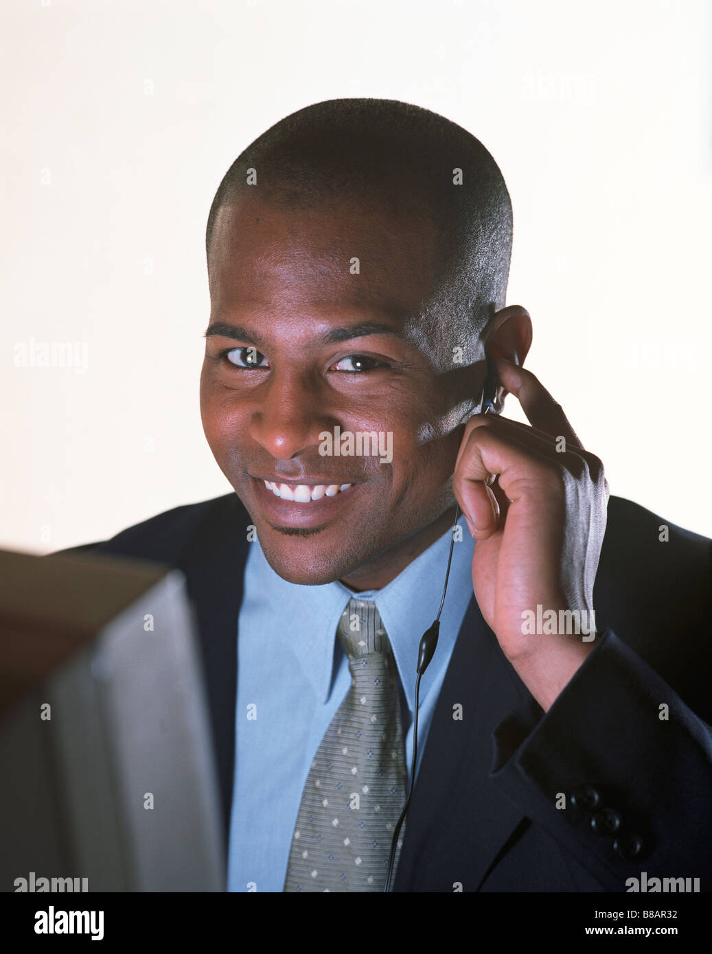 FV3370, Peter Mintz; African-American Businessman Using Earphone Stock ...
