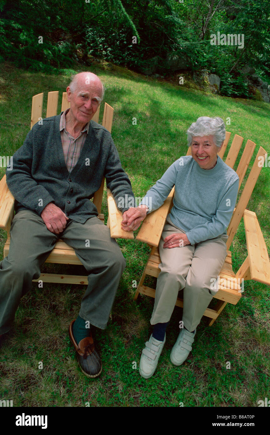 FV3415, Trevor Bonderud; Senior Couple Muskoka Chairs, Holding Hands ...