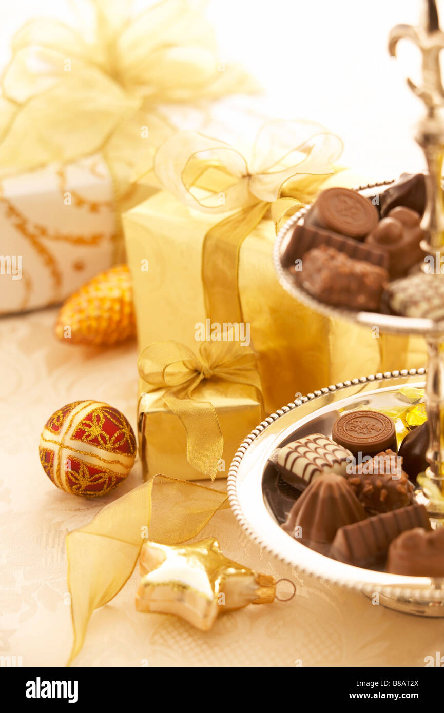 Chocolates Presents Wrapped Gold Paper Stock Photo - Alamy