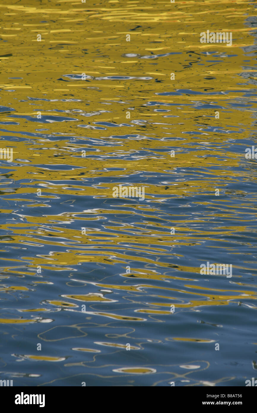 boat pattern reflection on water ripples in sea Stock Photo - Alamy