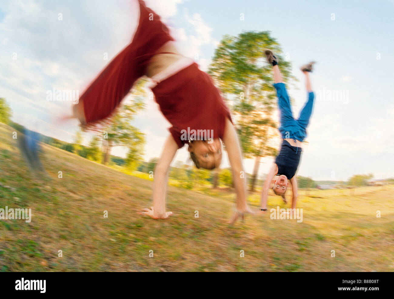 FV3591, Natural Moments Photography; Children Doing Cartwheels Stock ...