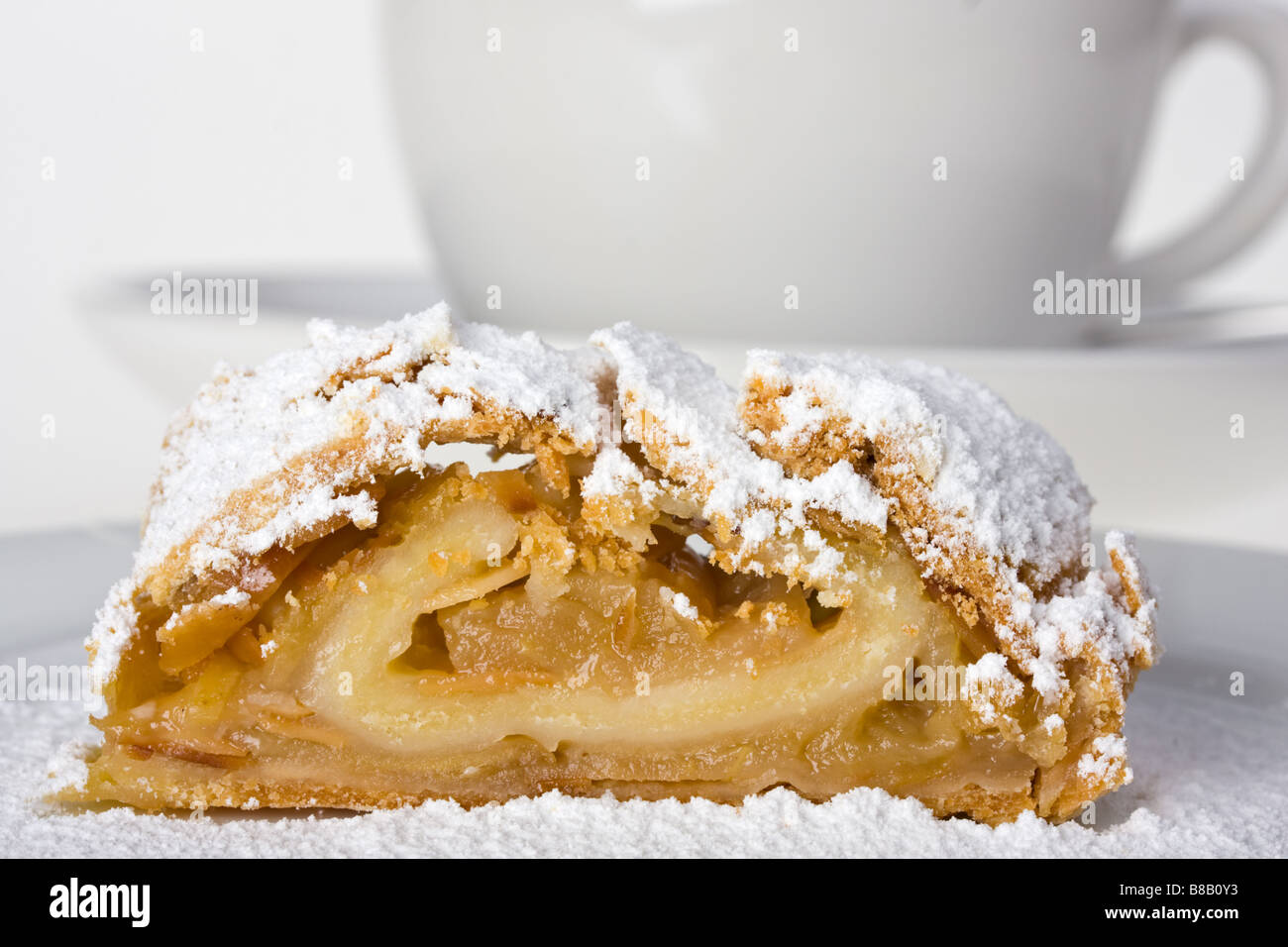 detail of an apple strudel with icing sugar Stock Photo - Alamy
