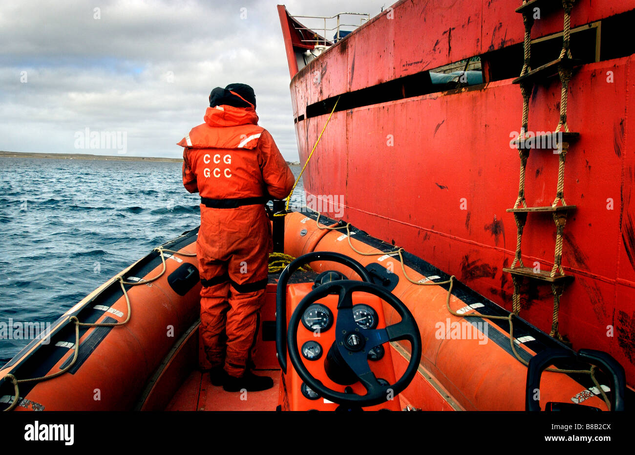 Coast Guard Zodiac moored to Sir Wilfred Laurier, Cambridge Bay ...