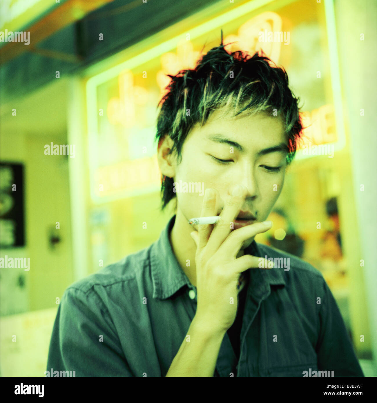 FV3709, Huy Lam; Young Man Smoking Stock Photo - Alamy