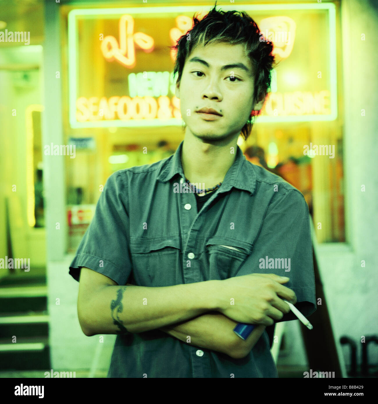 FV3713, Huy Lam; Young Man Cigarette Stock Photo - Alamy