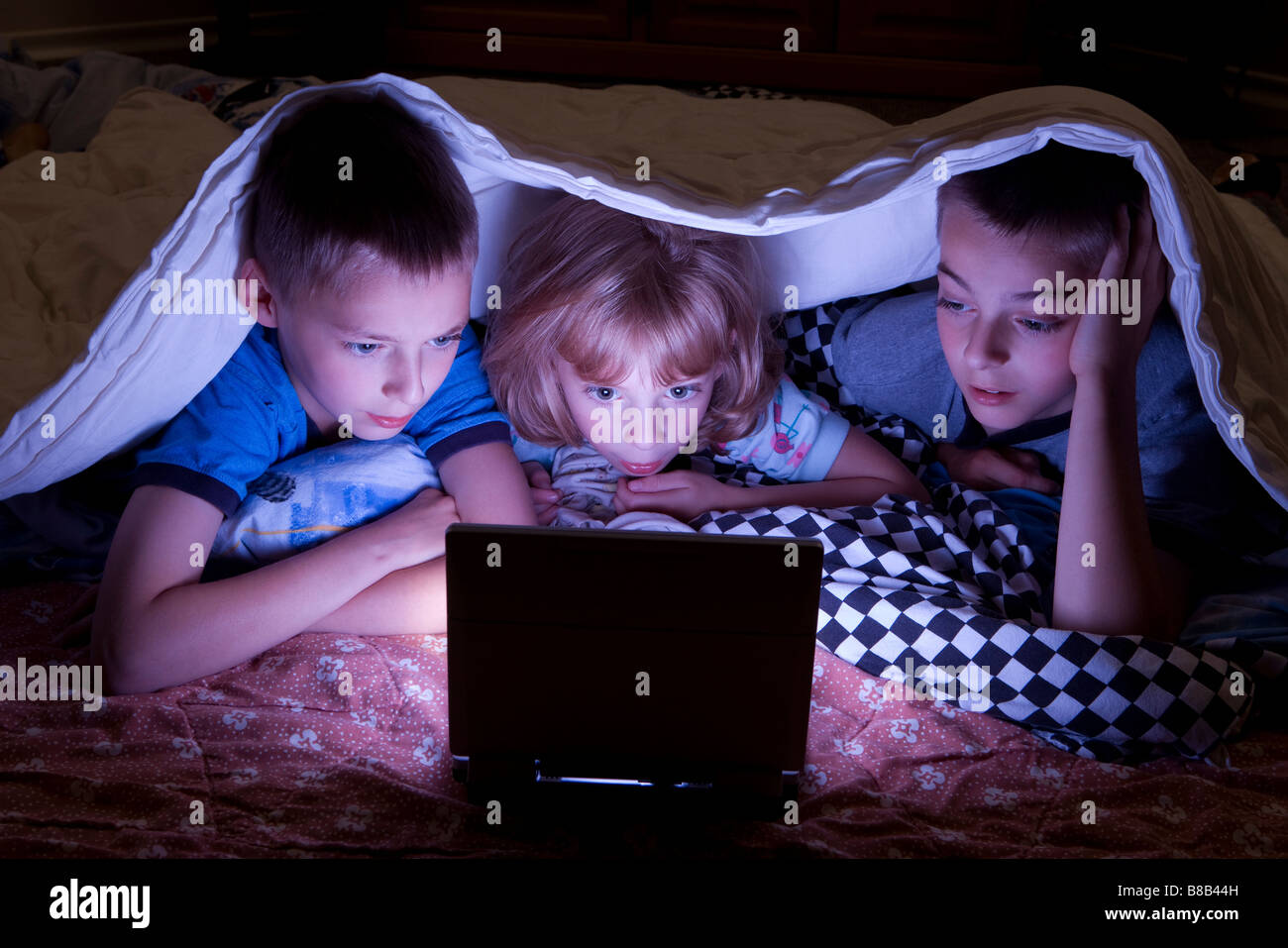 Children watching at night Stock Photo - Alamy