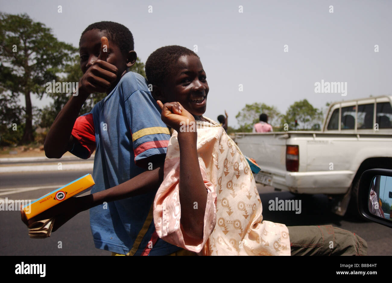 Two happy children in Ghana, Africa, selling gum on the street Stock ...