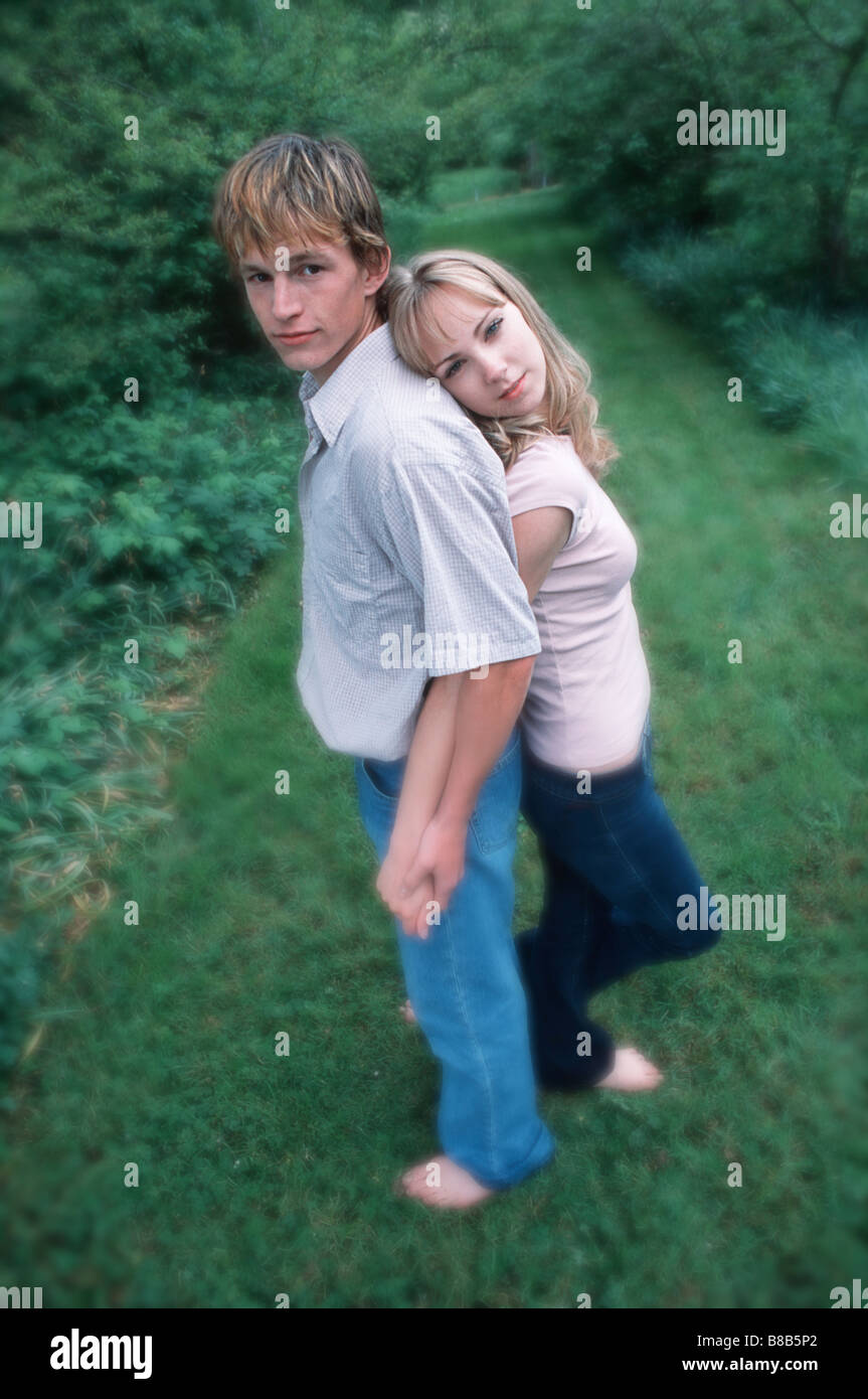FV3835, Trevor Bonderud; Couple Back to Back Grass Stock Photo - Alamy