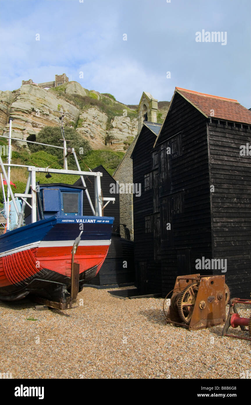 Hastings, East Sussex, England, UK. Fishing boat among 'Net Shops ...