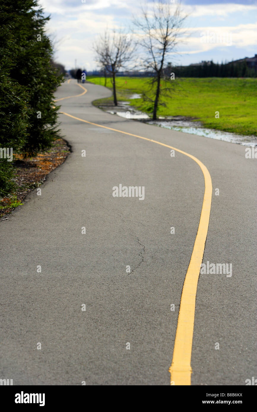 A bike path in a urban area Stock Photo - Alamy