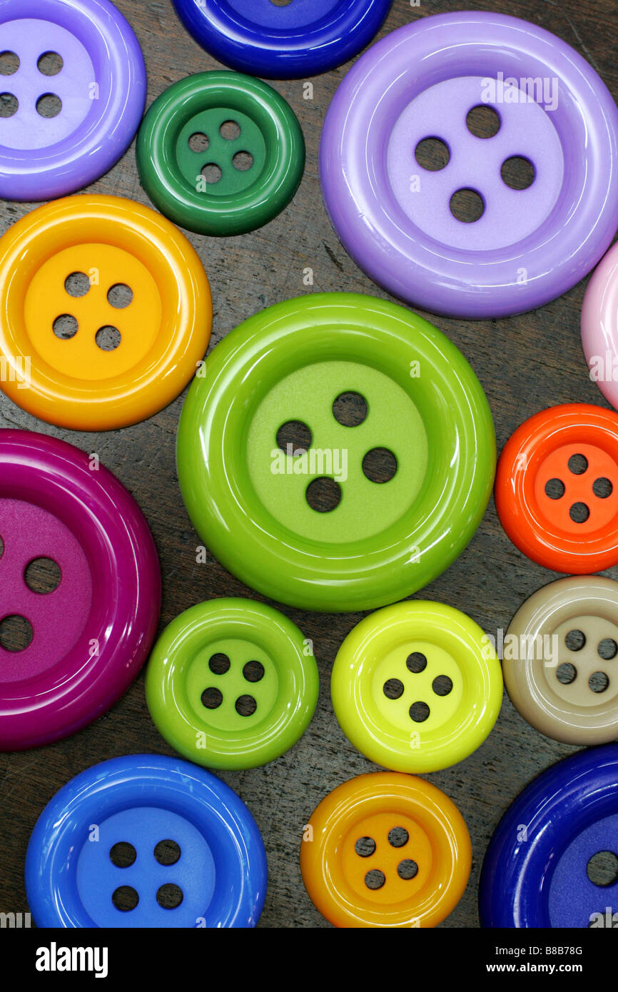Buttons on top of a table Stock Photo - Alamy
