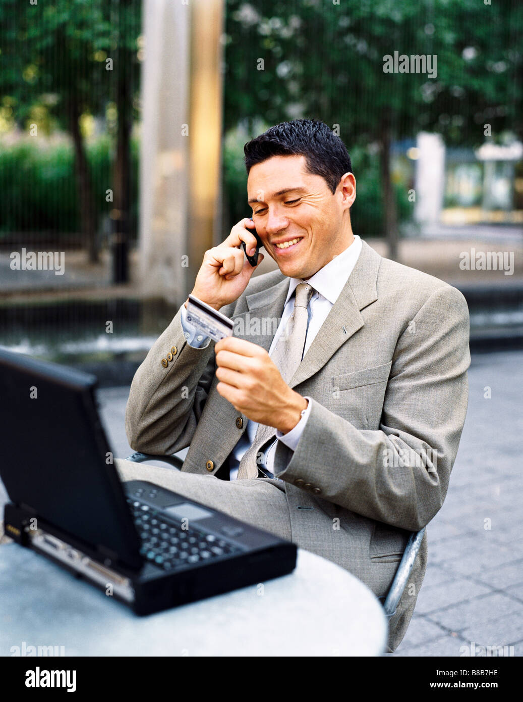 FV4012, Peter Mintz; Businessman Table Cell Phone Laptop Stock Photo ...
