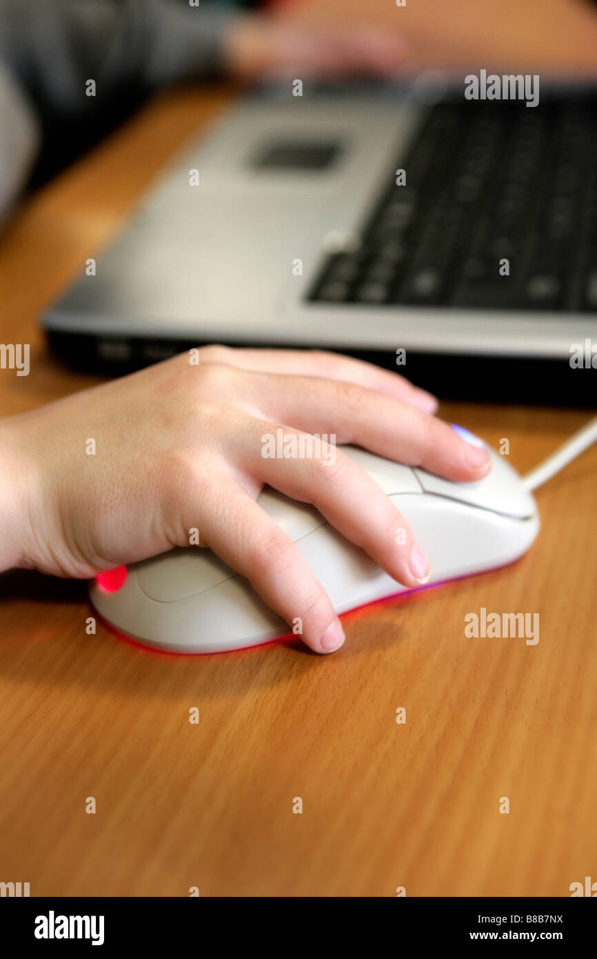 Child computer classroom hand mouse hi-res stock photography and images ...