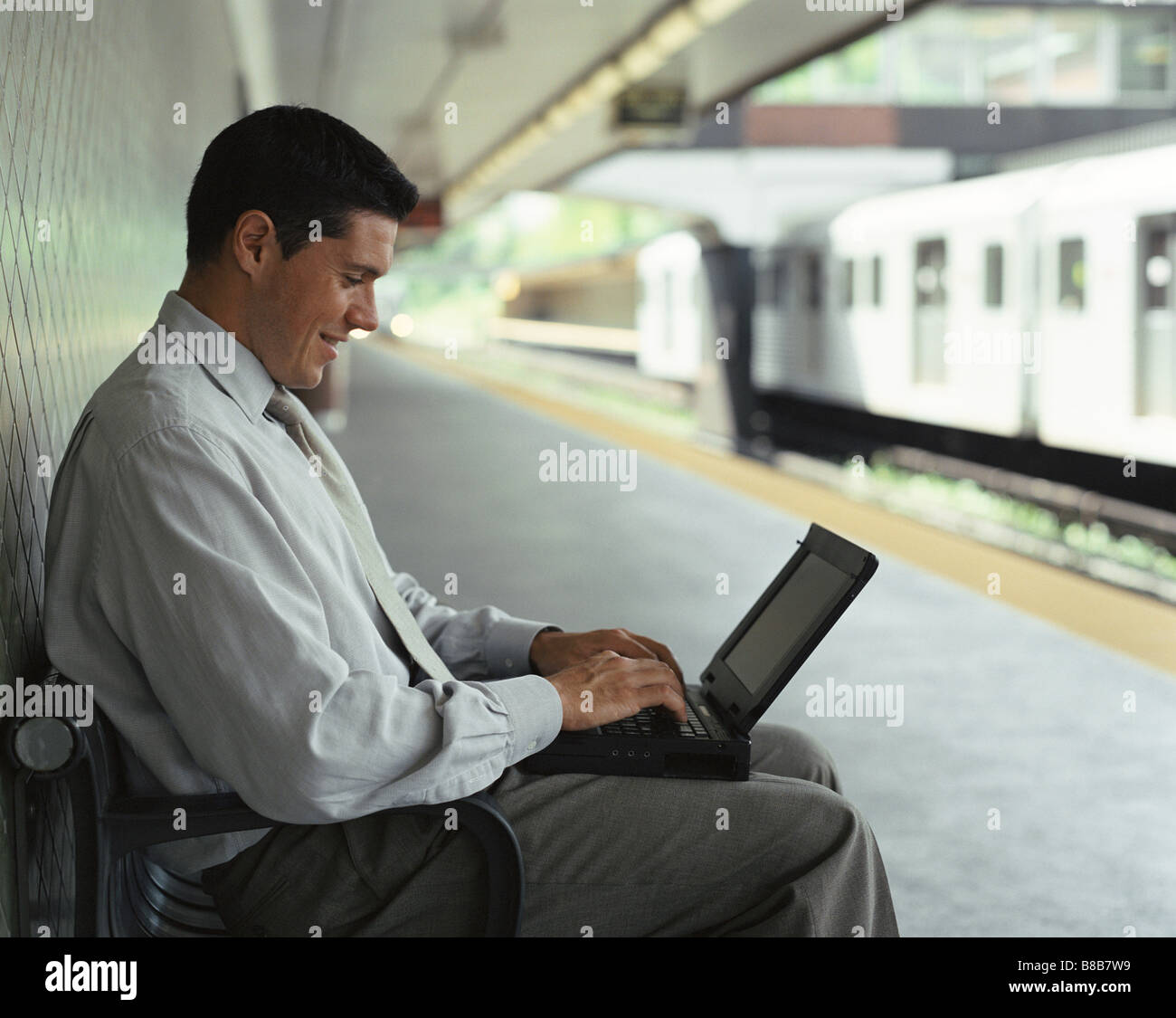 FV4029, Peter Mintz; Man Subway Station using Laptop Stock Photo - Alamy