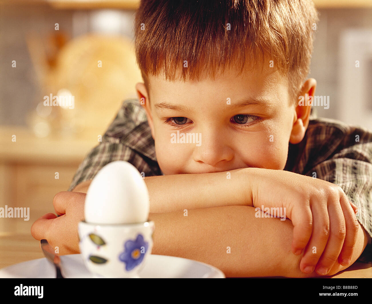 FV4079, Matthew Plexman; Boy Looking Hard Boiled Egg Stock Photo - Alamy