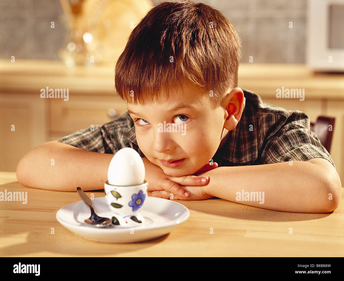 FV4080, Matthew Plexman; Boy Looking Hard Boiled Egg Stock Photo - Alamy