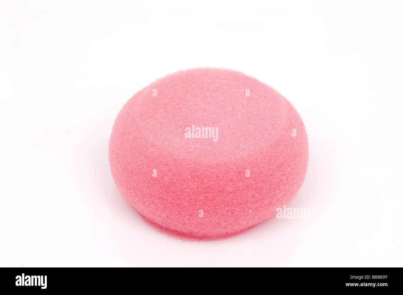 Pink cleaning sponge cut out on a white background Stock Photo - Alamy