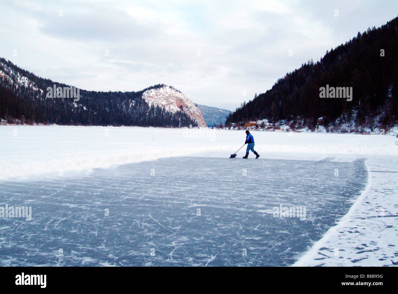 Man shoveling objects hi-res stock photography and images - Alamy